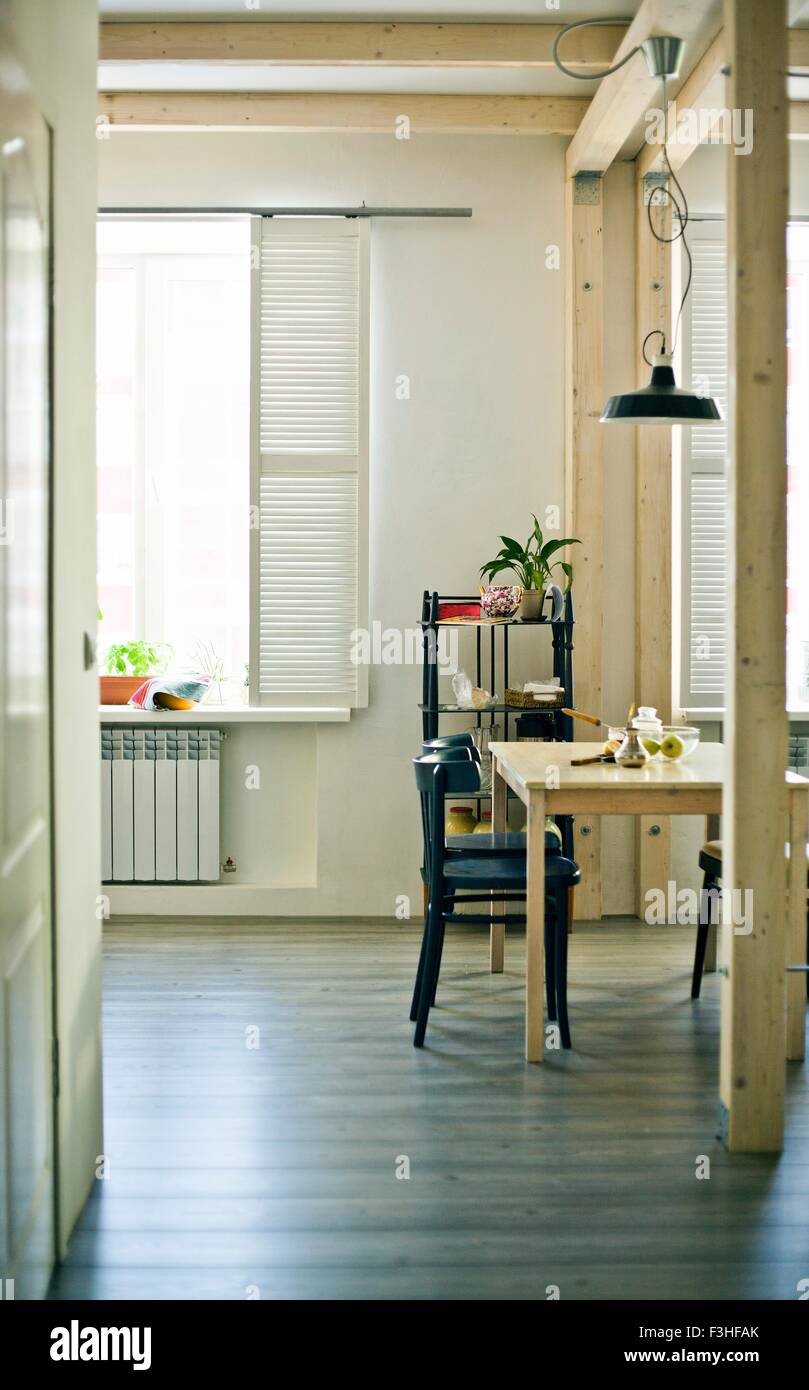 View of dining area with table and chair Stock Photo - Alamy