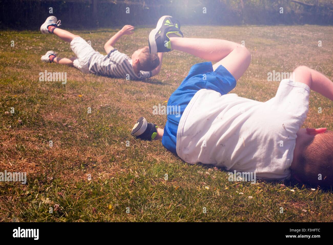 Child rolling on ground hi-res stock photography and images - Alamy