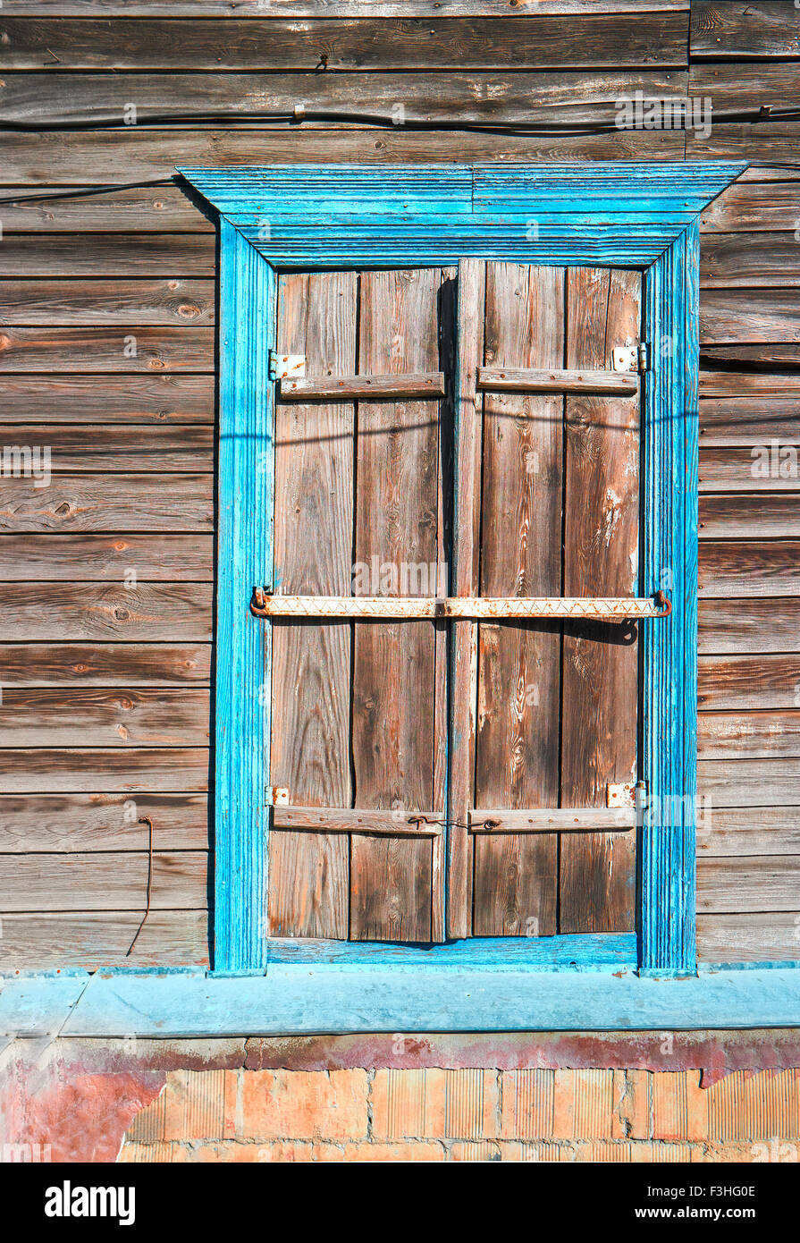 Wooden window with frame painted in blue color, Astrakhan, Russia Stock ...