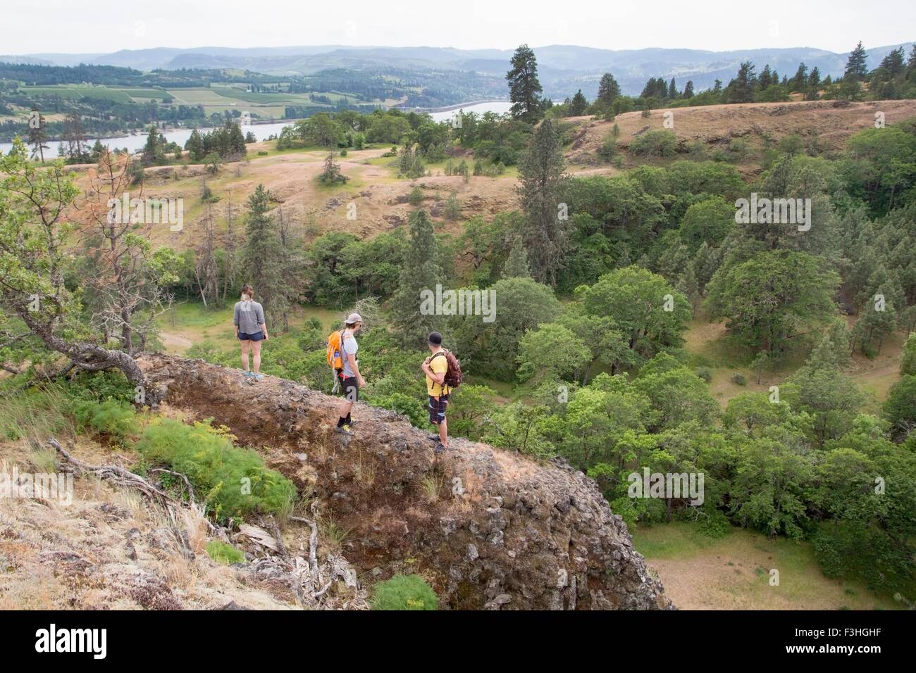 Small group of people hiking along ridge, elevated view Stock Photo - Alamy