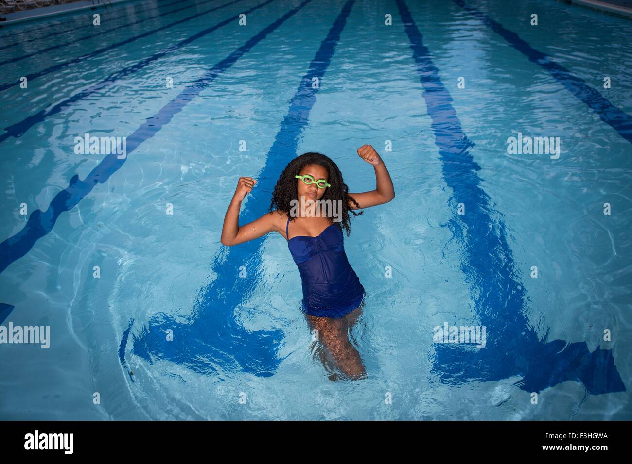 Standing by swimming pool hi-res stock photography and images - Alamy