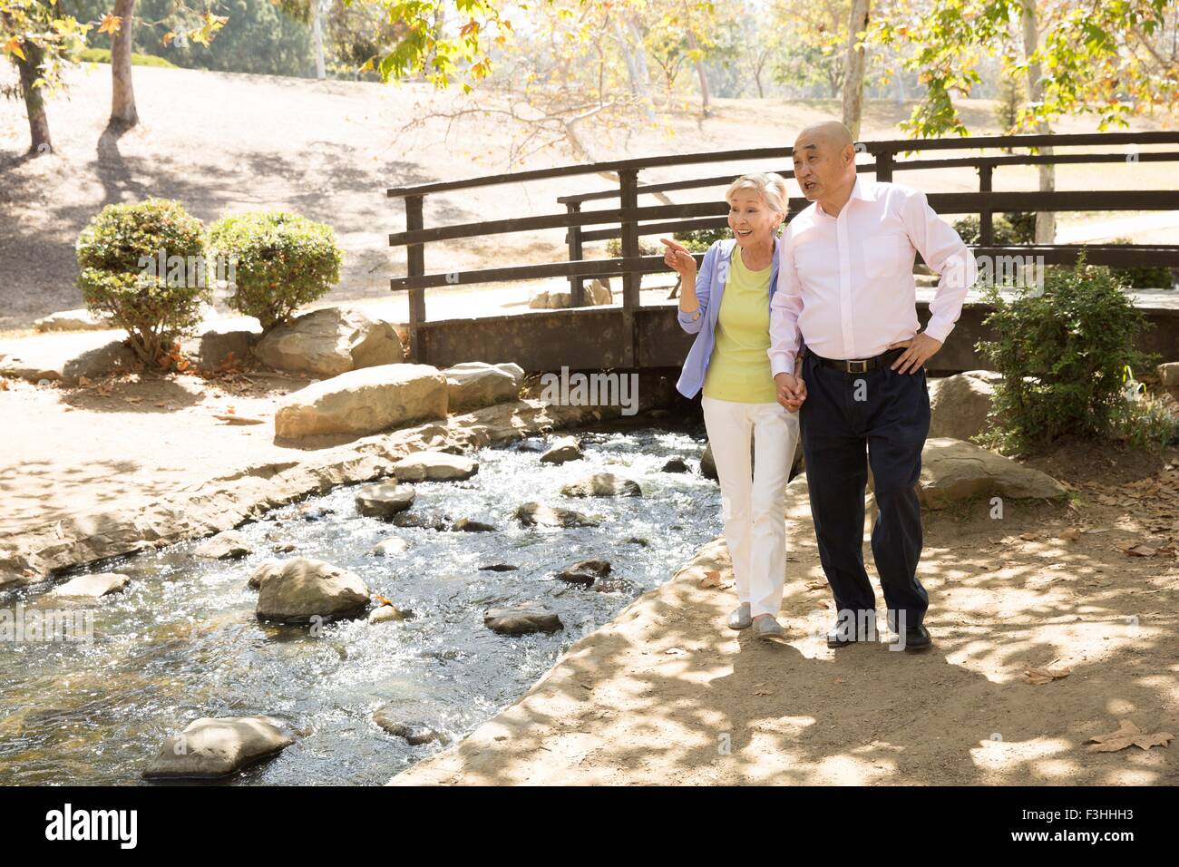 Woman standing beside river hi-res stock photography and images - Alamy