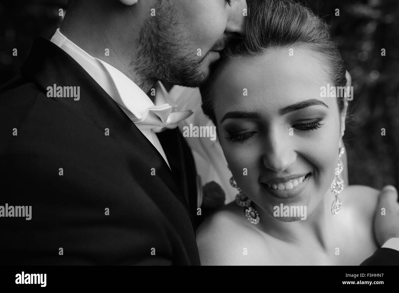 Beautiful happy couple standing Black and White Stock Photos & Images ...