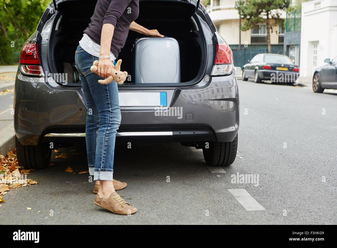 Woman suitcase in white hi-res stock photography and images - Alamy