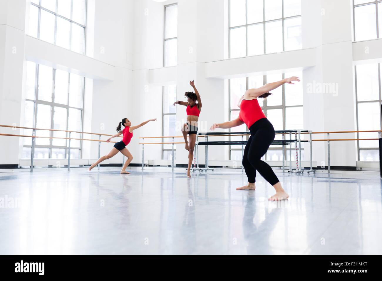 Young women in dance studio dancing Stock Photo - Alamy