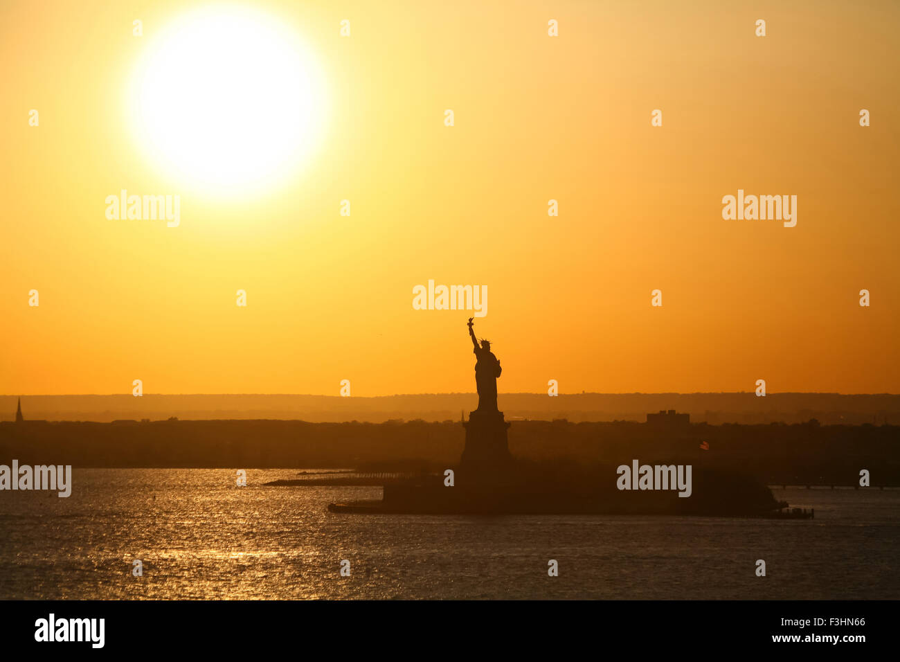 The Statue of Liberty at sunset in New York City, USA Stock Photo - Alamy