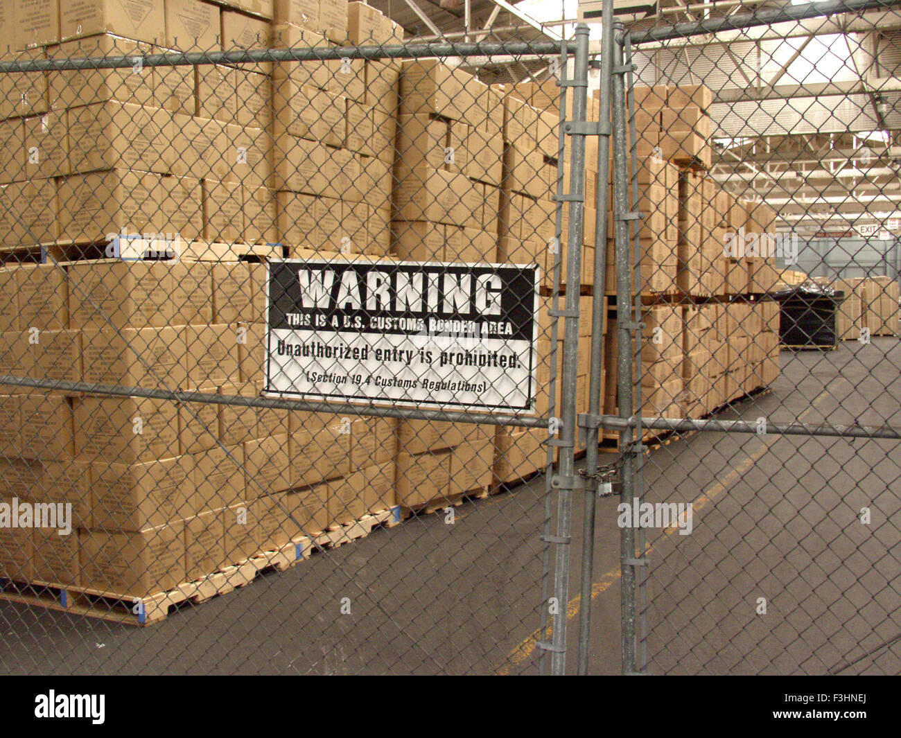 warning bonded area sign in warehouse Stock Photo - Alamy