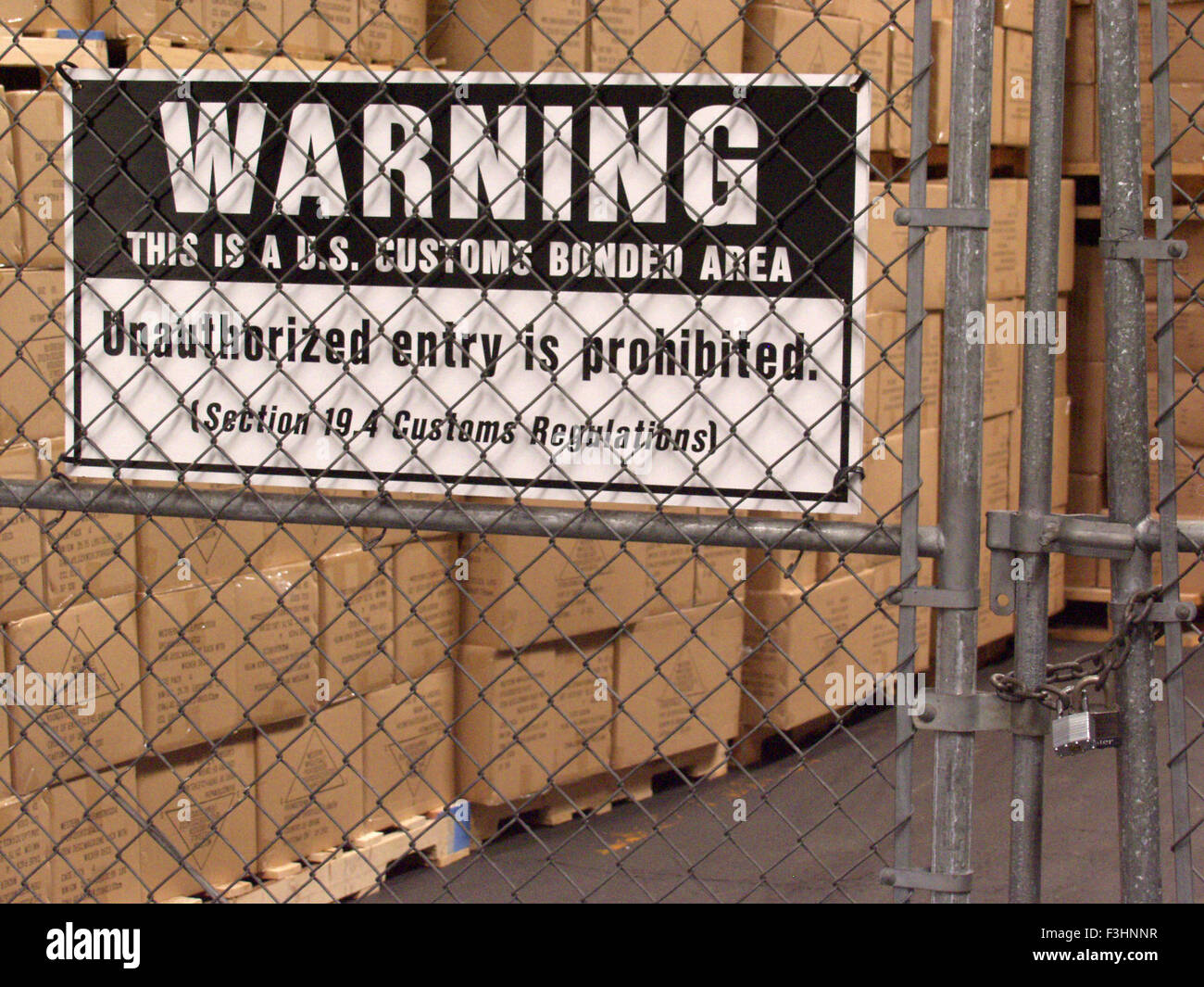 warning bonded area sign in warehouse Stock Photo - Alamy