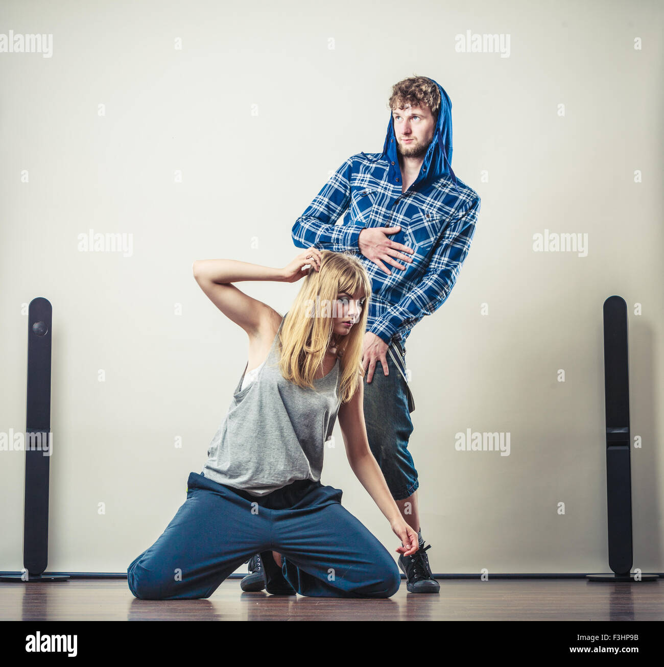 Two modern dancers couple woman and man dancing. Urban lifestyle. Hip ...