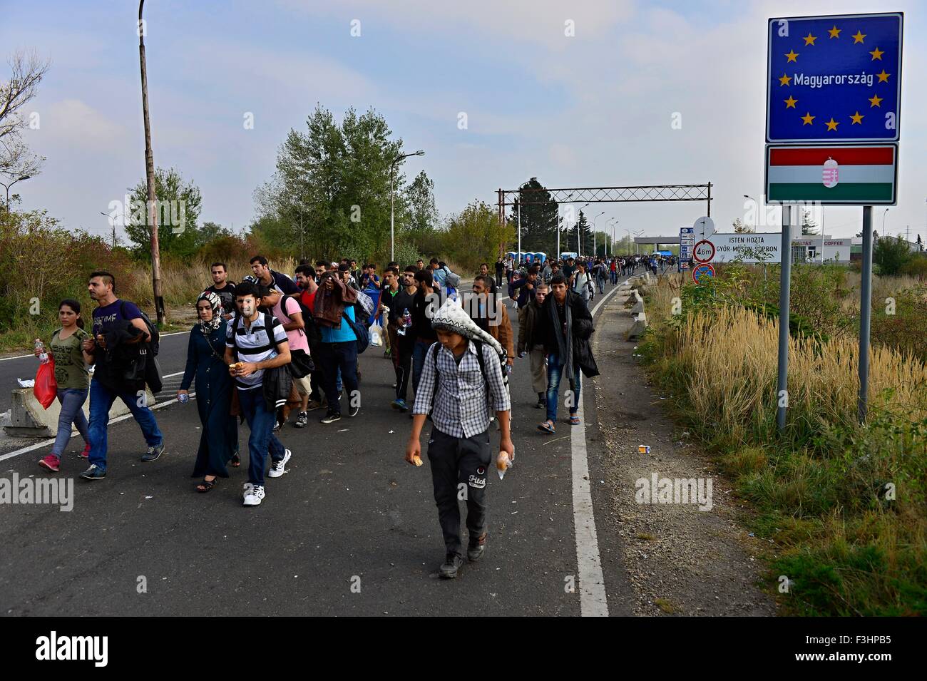 October 6,2015; Hegyeshalom in Hungary. Group of refugees leaving ...