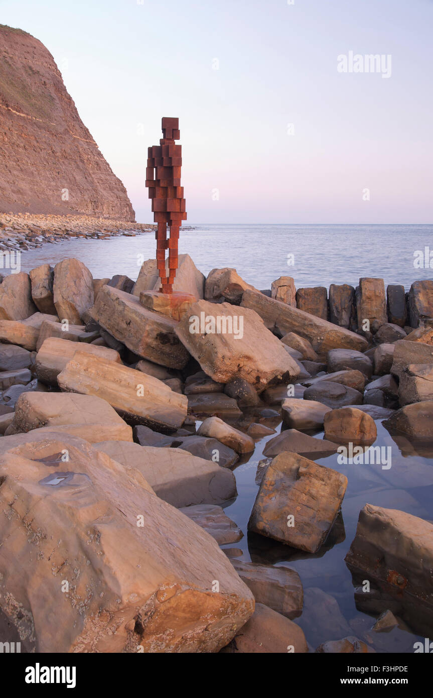 Antony Gormley’s life-sized iron sculpture of a human figure standing ...