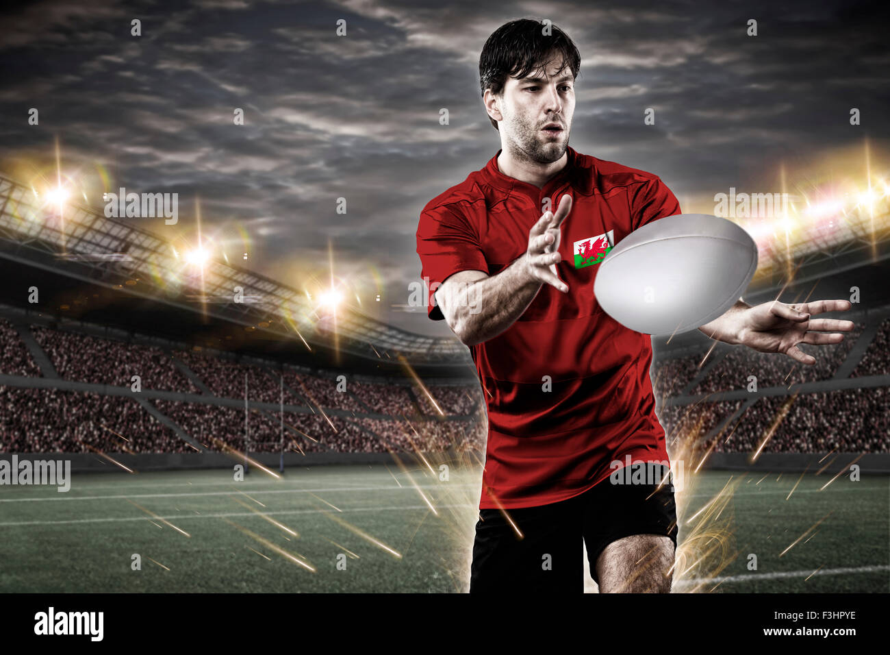 Welsh rugby player, wearing a red uniform in a stadium Stock Photo - Alamy