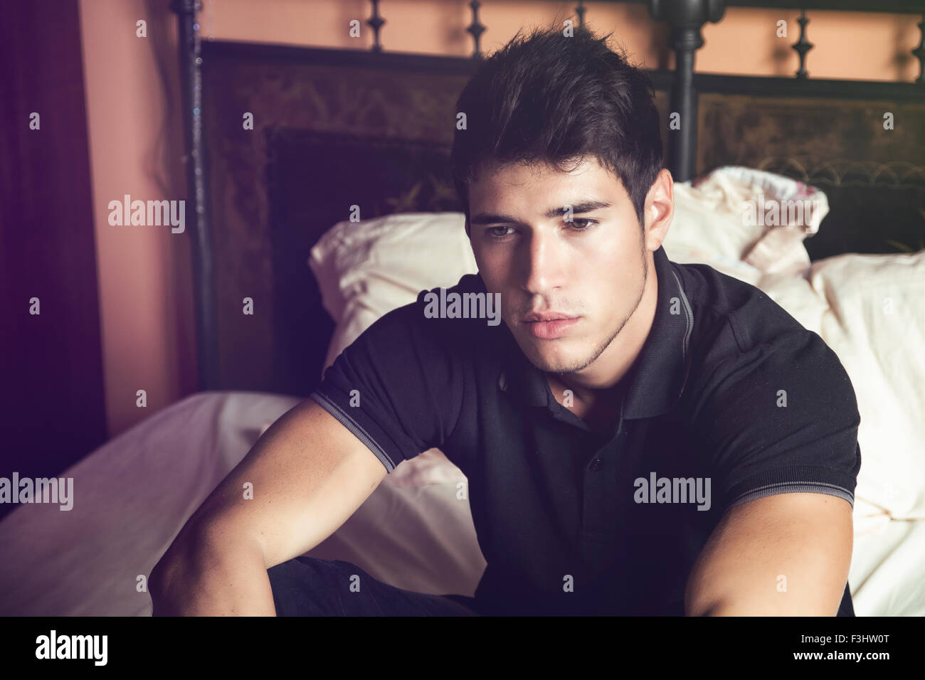 Man sitting up in bed hi-res stock photography and images - Alamy