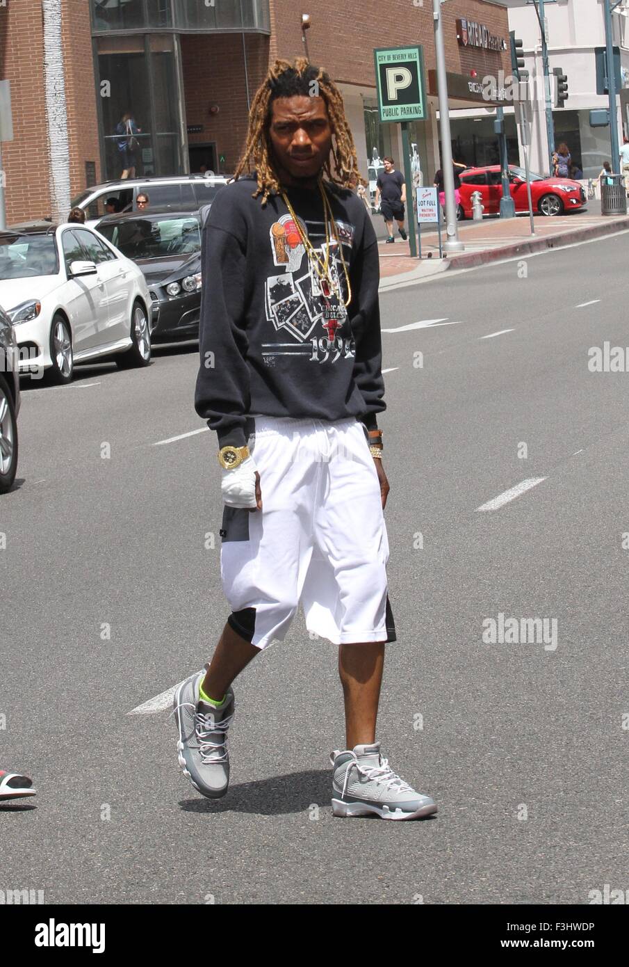 Rapper Fetty Wap leaves the doctors office with a bandaged hand in ...