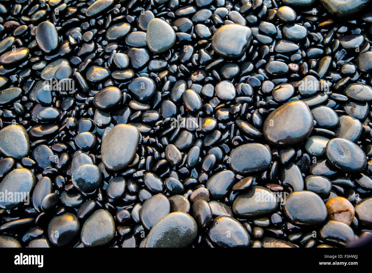 Shiny pebbles hi-res stock photography and images - Alamy