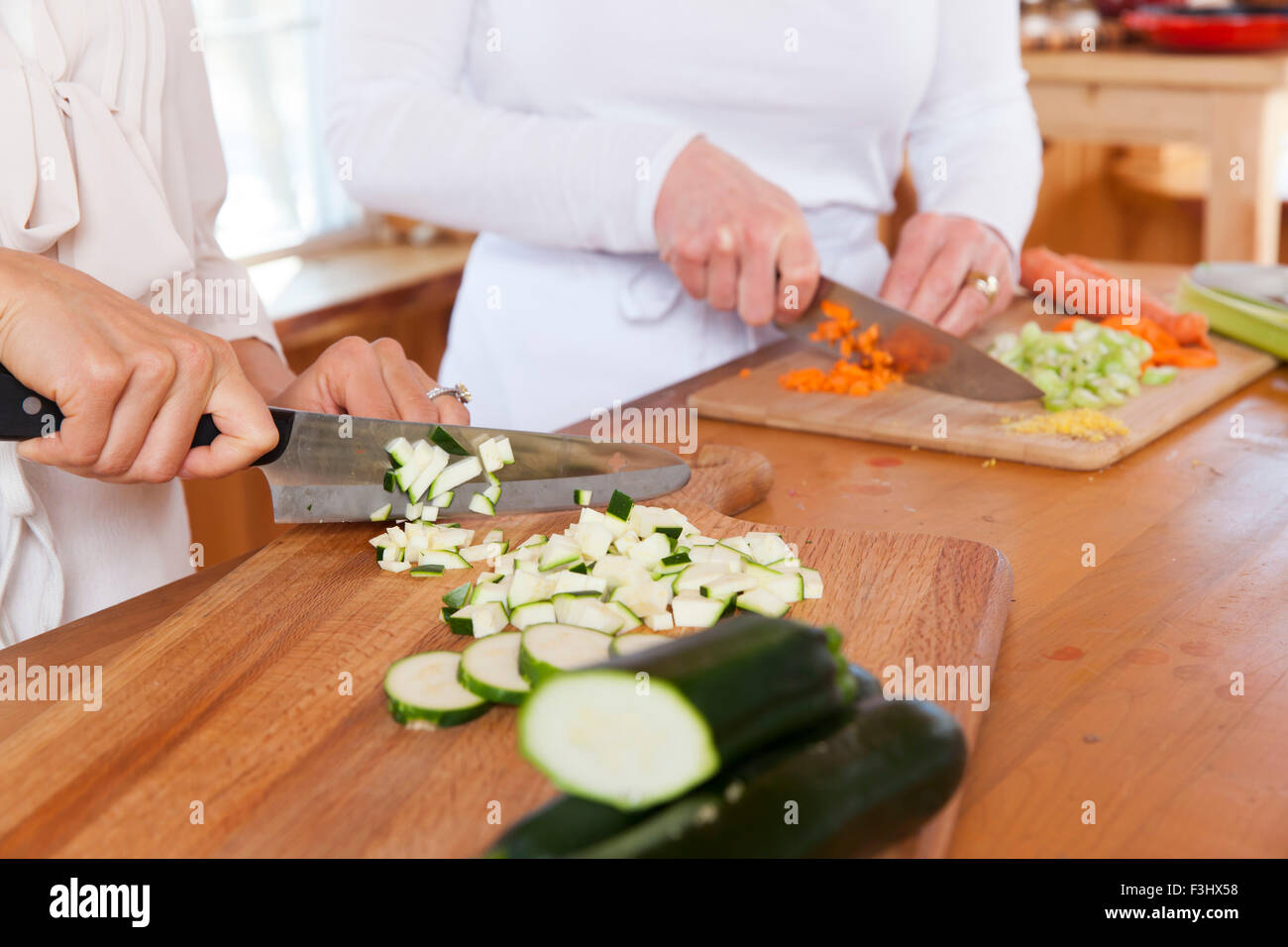 Chopping veggies hi-res stock photography and images - Alamy