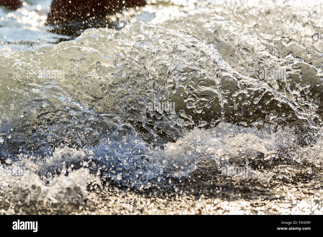 Sea surf at high tide on a pebble beach. Summer vacation. Travel ...