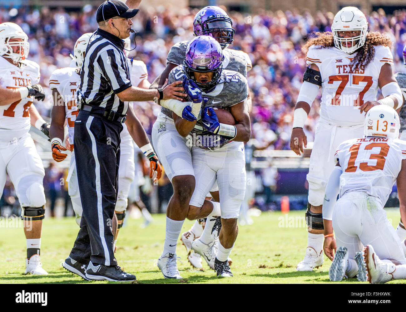 October 3rd, 2015:.TCU Horned Frogs linebacker Montrel Wilson (20) appears to have picked up a ...