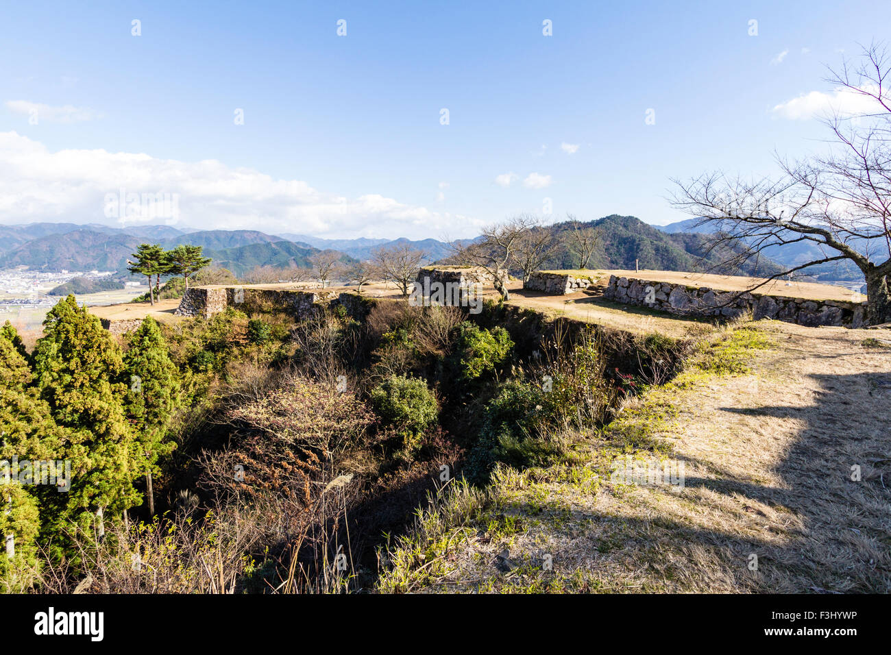 Takeda castle, a mountain top ruin with many Ishigaki stone walls. Path ...