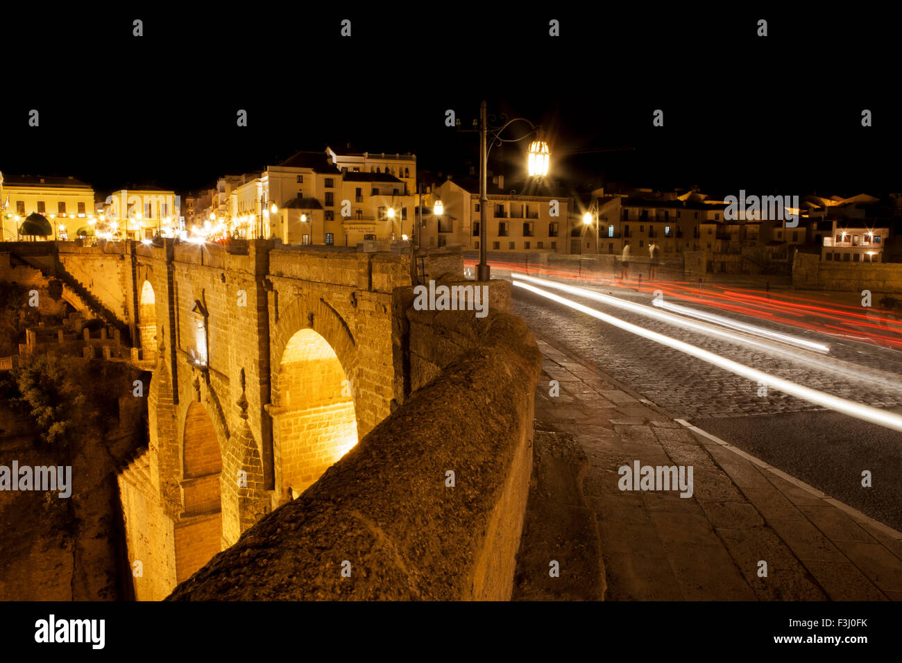 Illuminated bridge from old town of Ronda, Spain. Night scene Stock ...