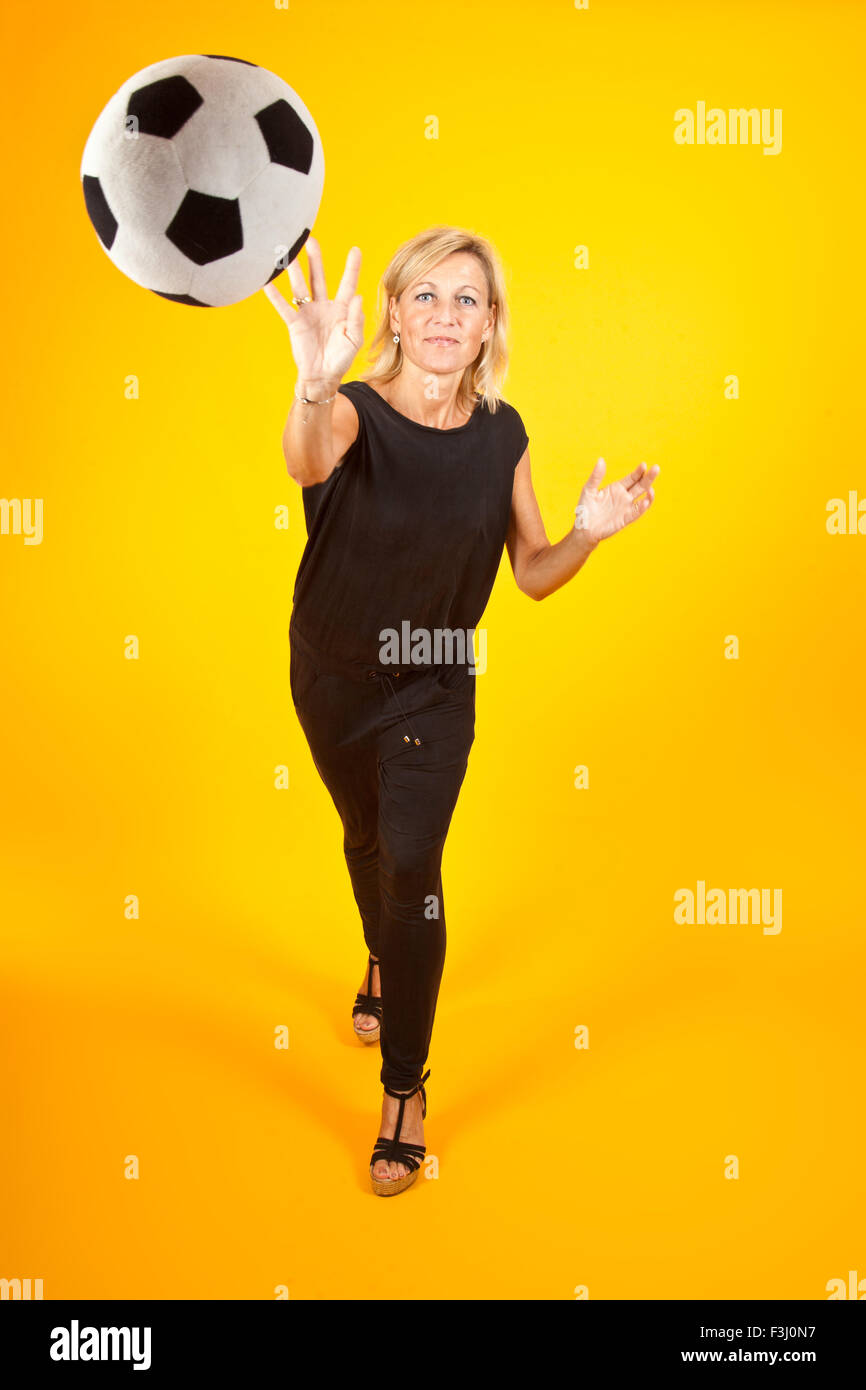 Girl throw ball hi-res stock photography and images - Alamy
