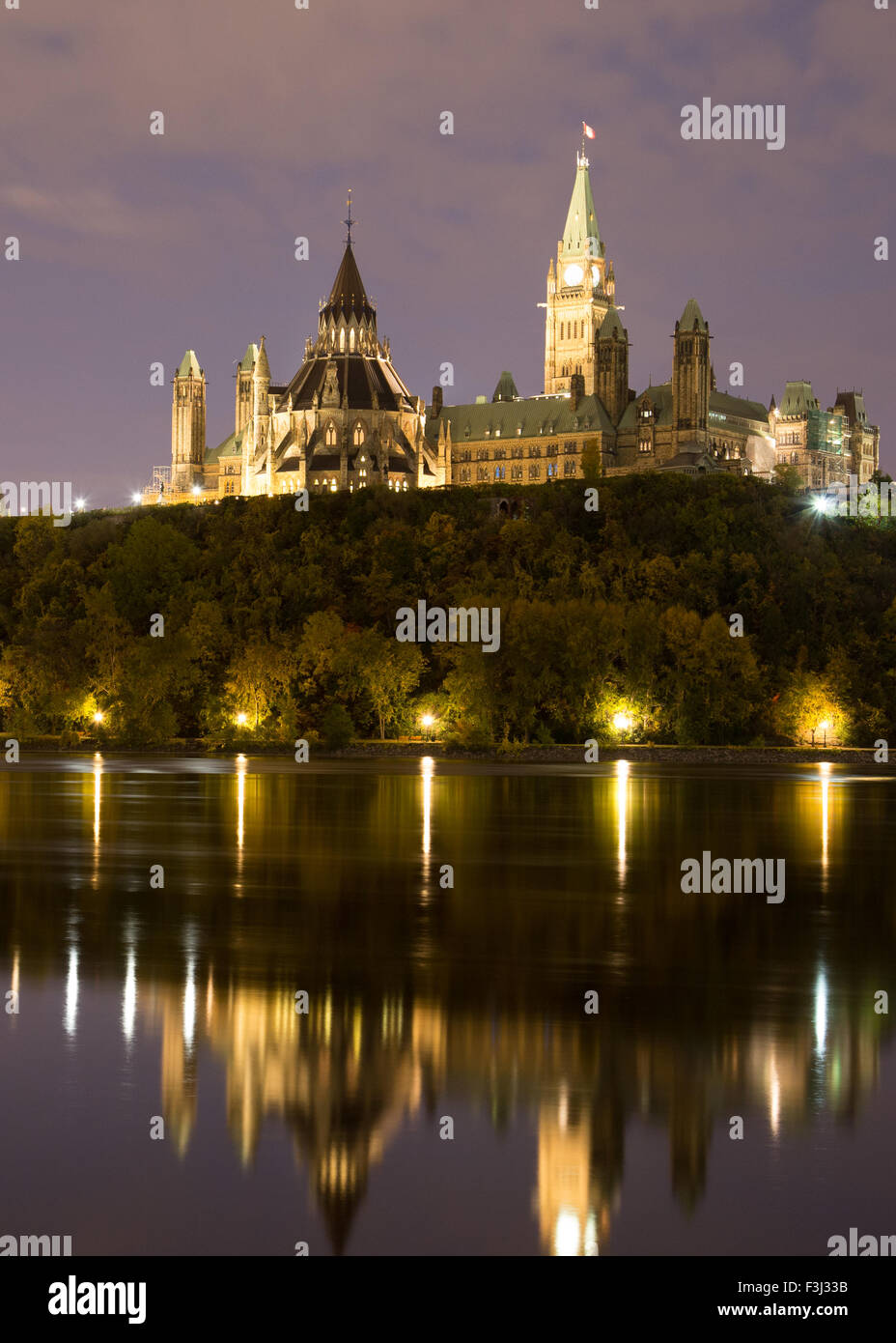 Parliament Hill in Ottawa at night. Reflections can be seen in River Ottawa Stock Photo - Alamy