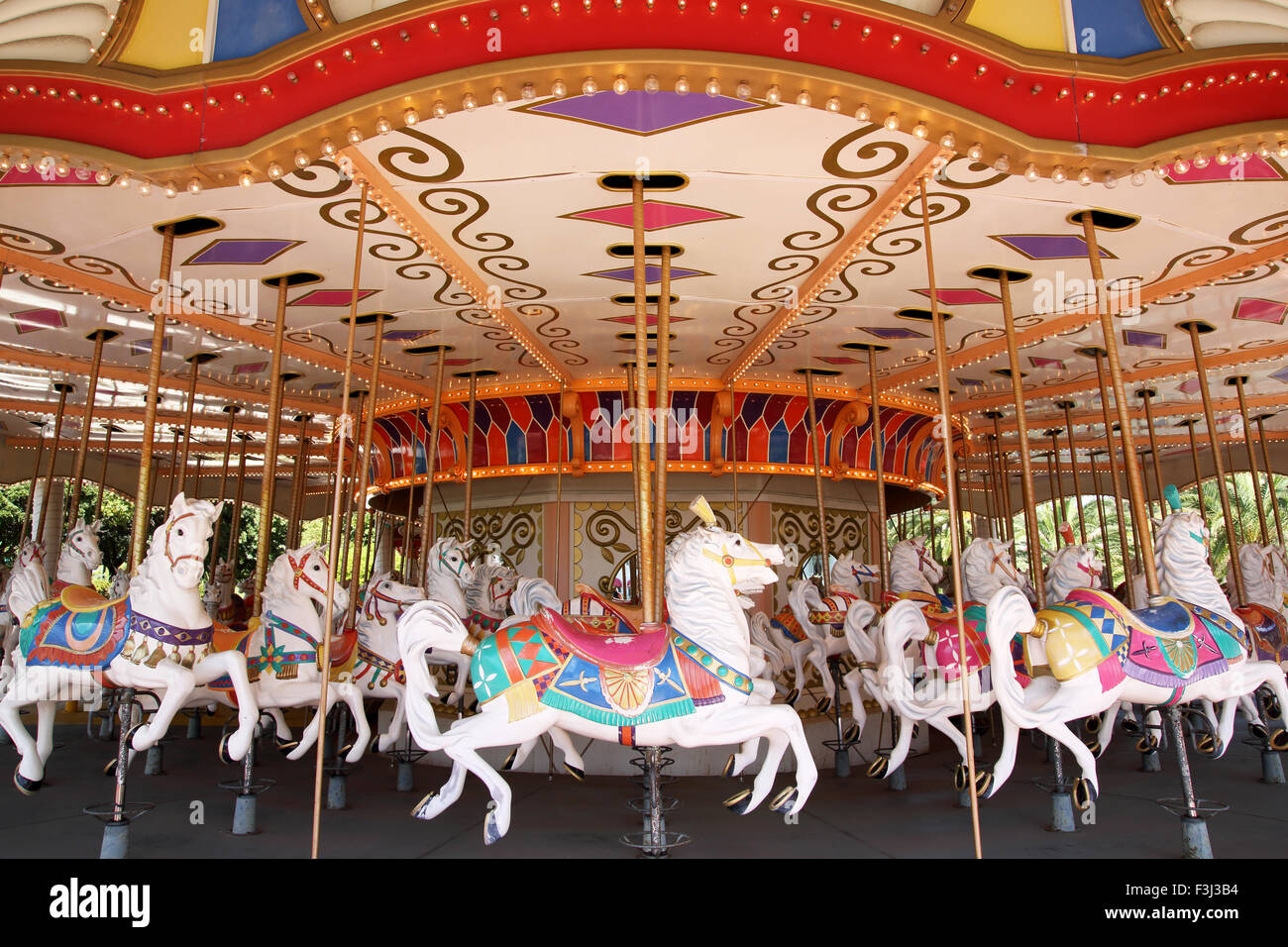 Empty carousel merry go round park attraction Stock Photo - Alamy