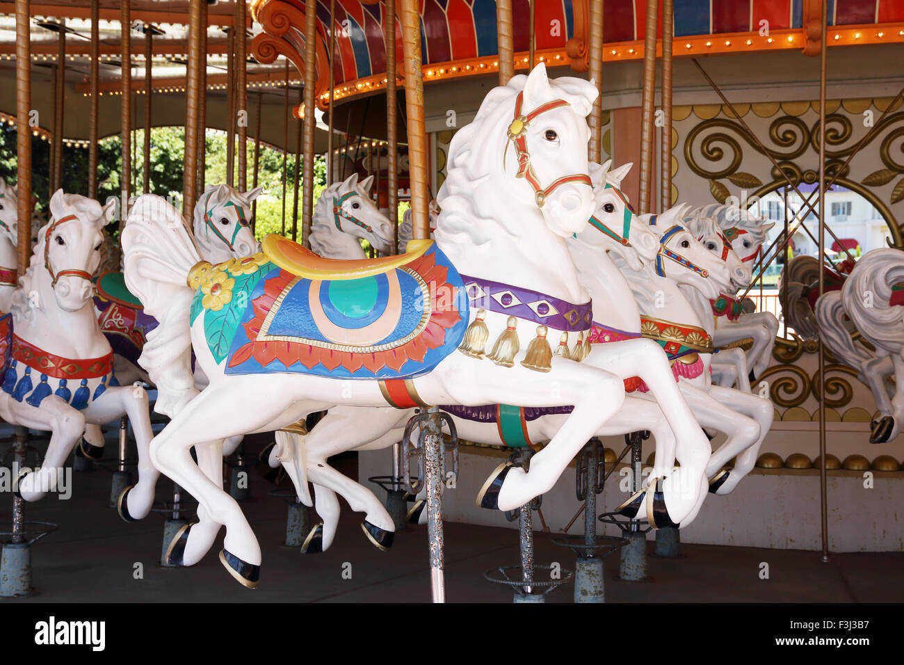 Empty carousel merry go round park attraction Stock Photo - Alamy