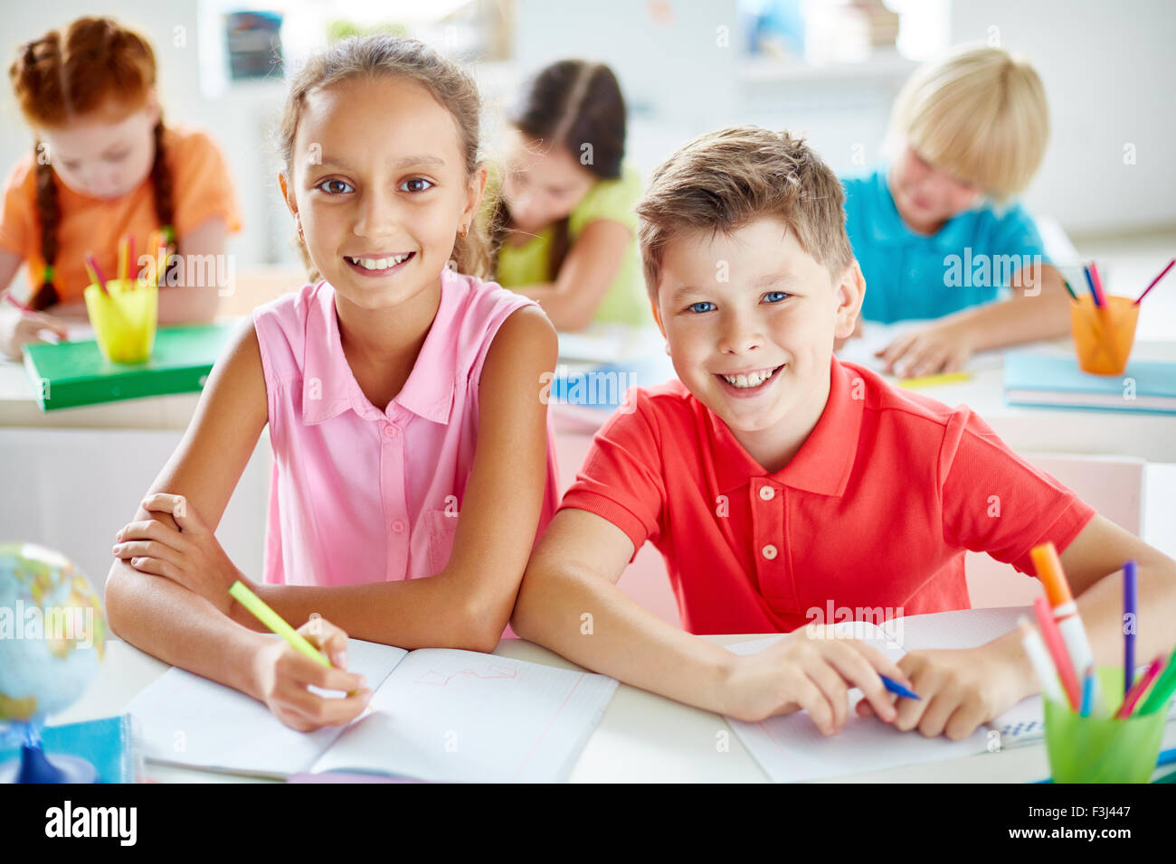 Schoolchildren looking at camera hi-res stock photography and images ...
