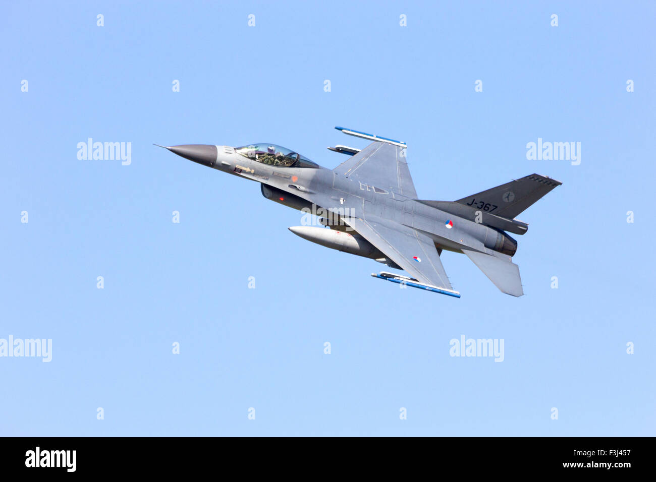 Netherlands Air Force F-16 flyby Stock Photo - Alamy