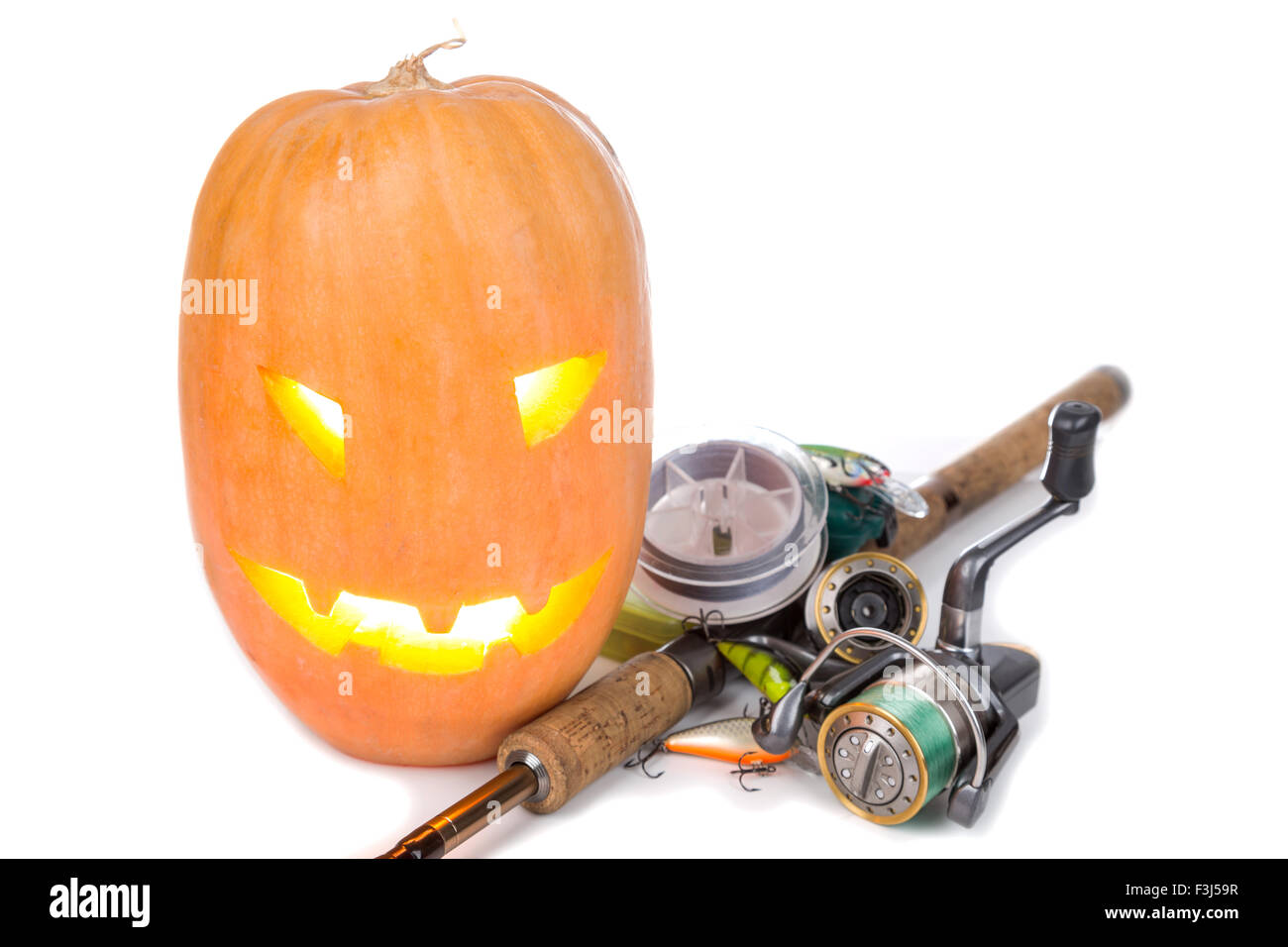 halloween pumpkin head with fishing tackles on white background Stock ...