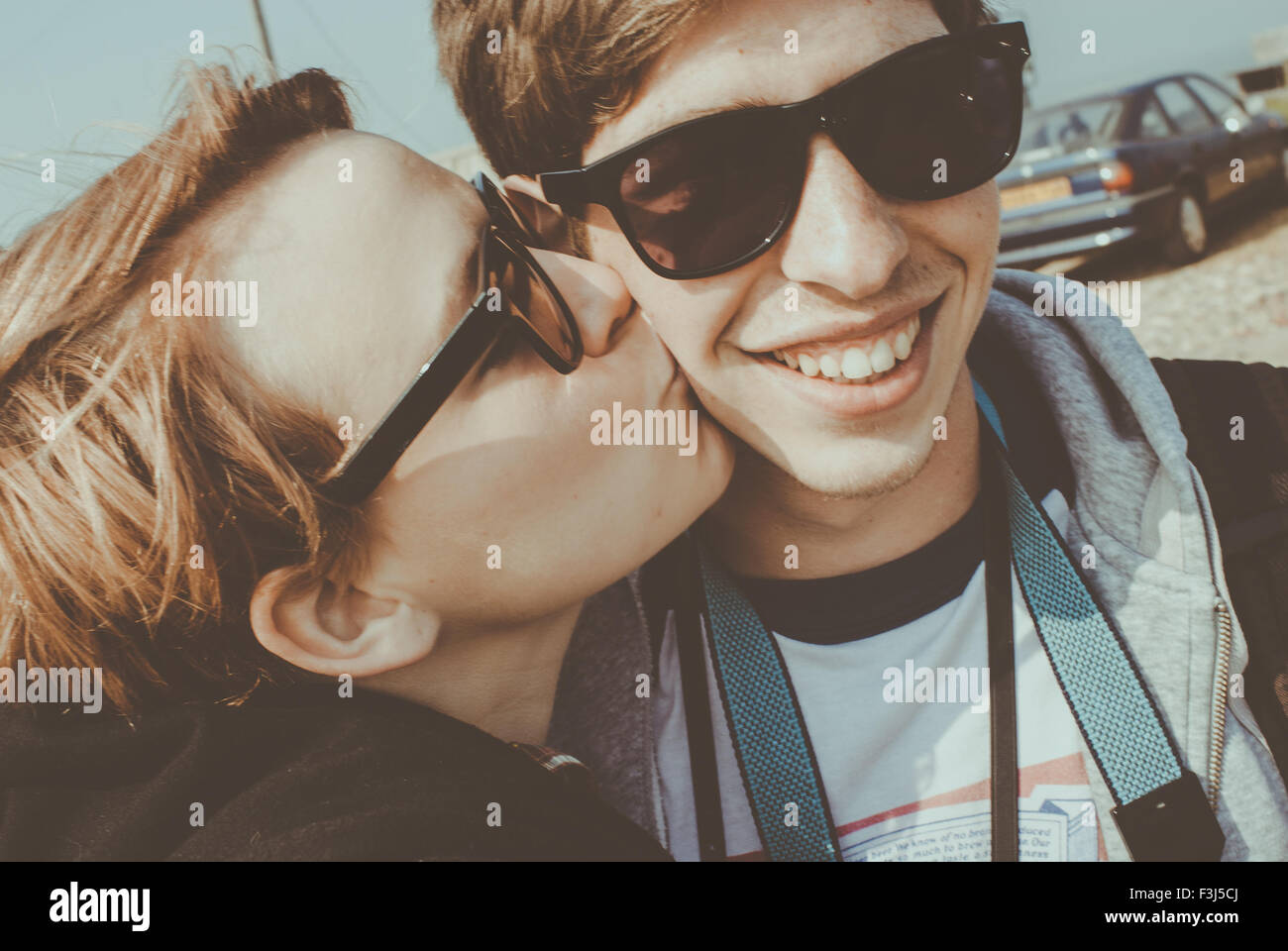 Cute young couple kissing selfie hi-res stock photography and images ...