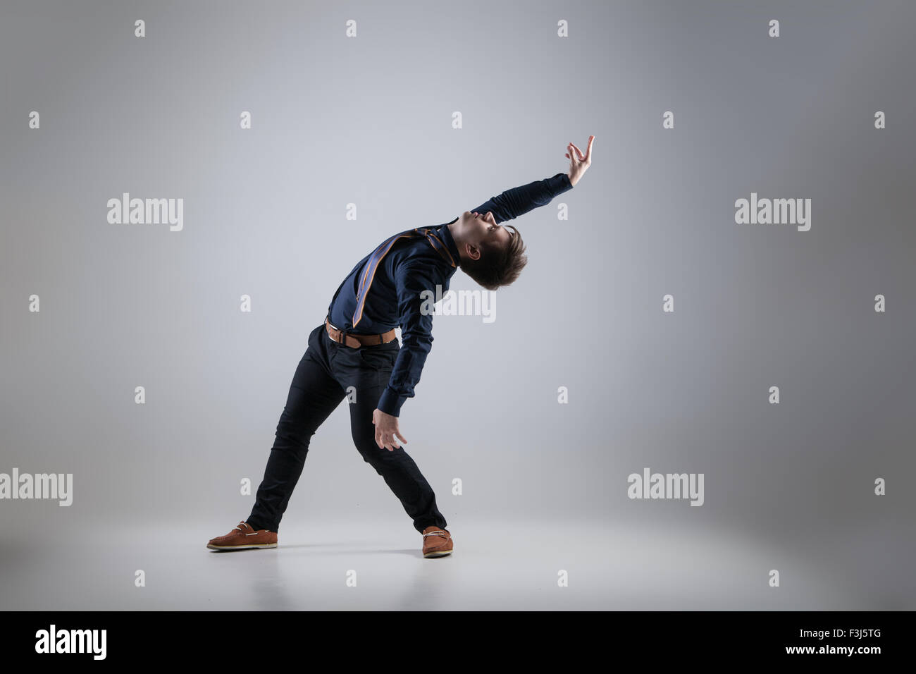Young attractive man dancing Stock Photo - Alamy