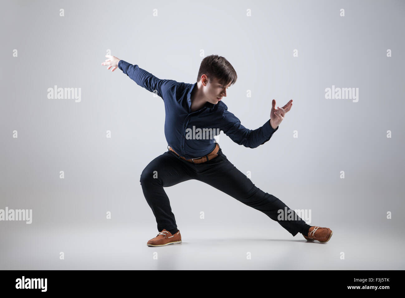 Young attractive man dancing Stock Photo - Alamy