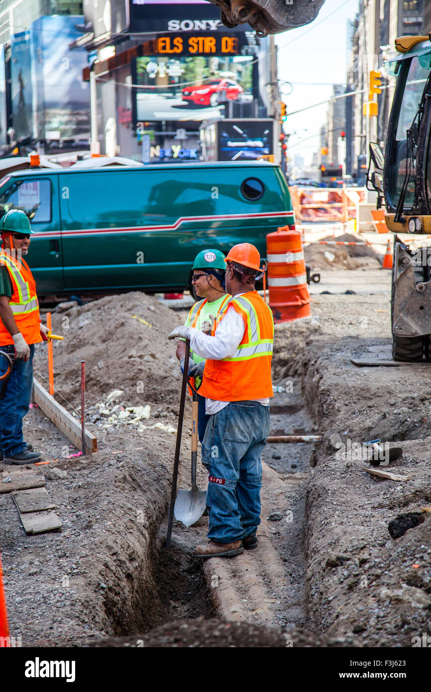 Construction worker on Times Square New York City Stock Photo - Alamy