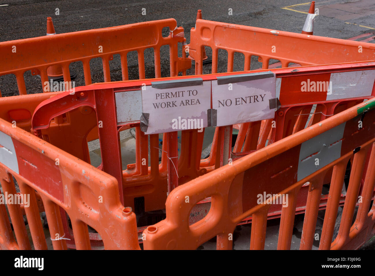 Permit to Work and No Entry notices in construction barriers, in a ...