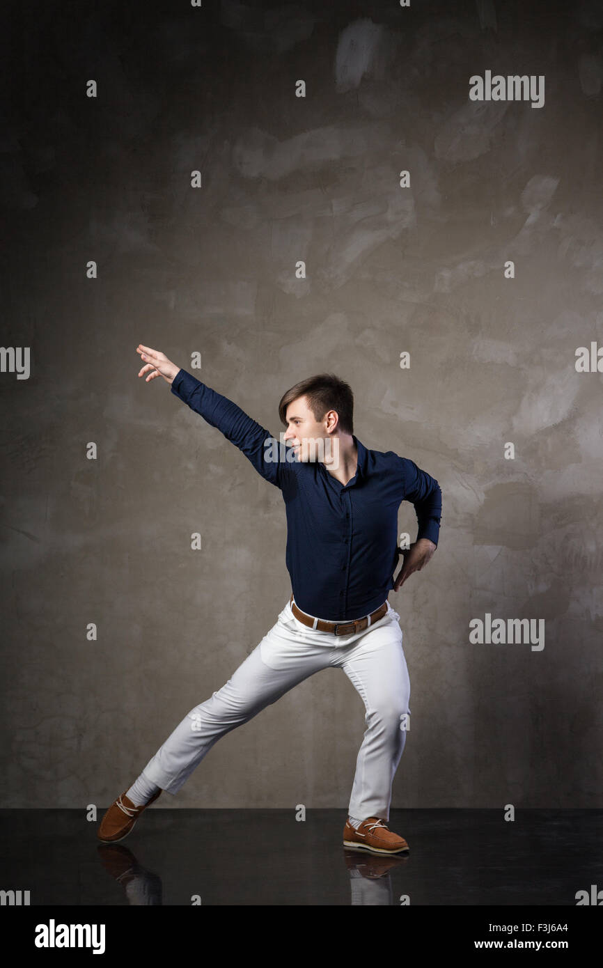 Young attractive man dancing Stock Photo - Alamy