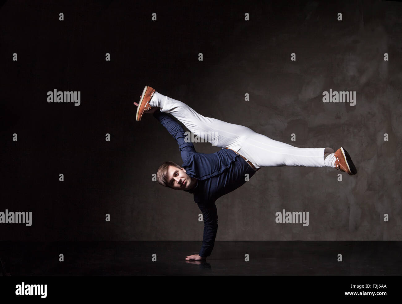 Young attractive man dancing Stock Photo - Alamy
