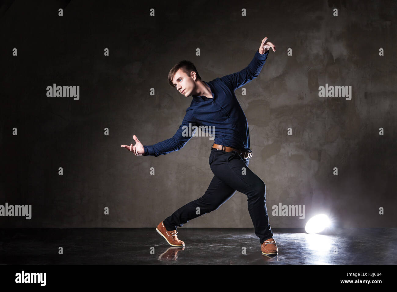 Young attractive man dancing Stock Photo - Alamy