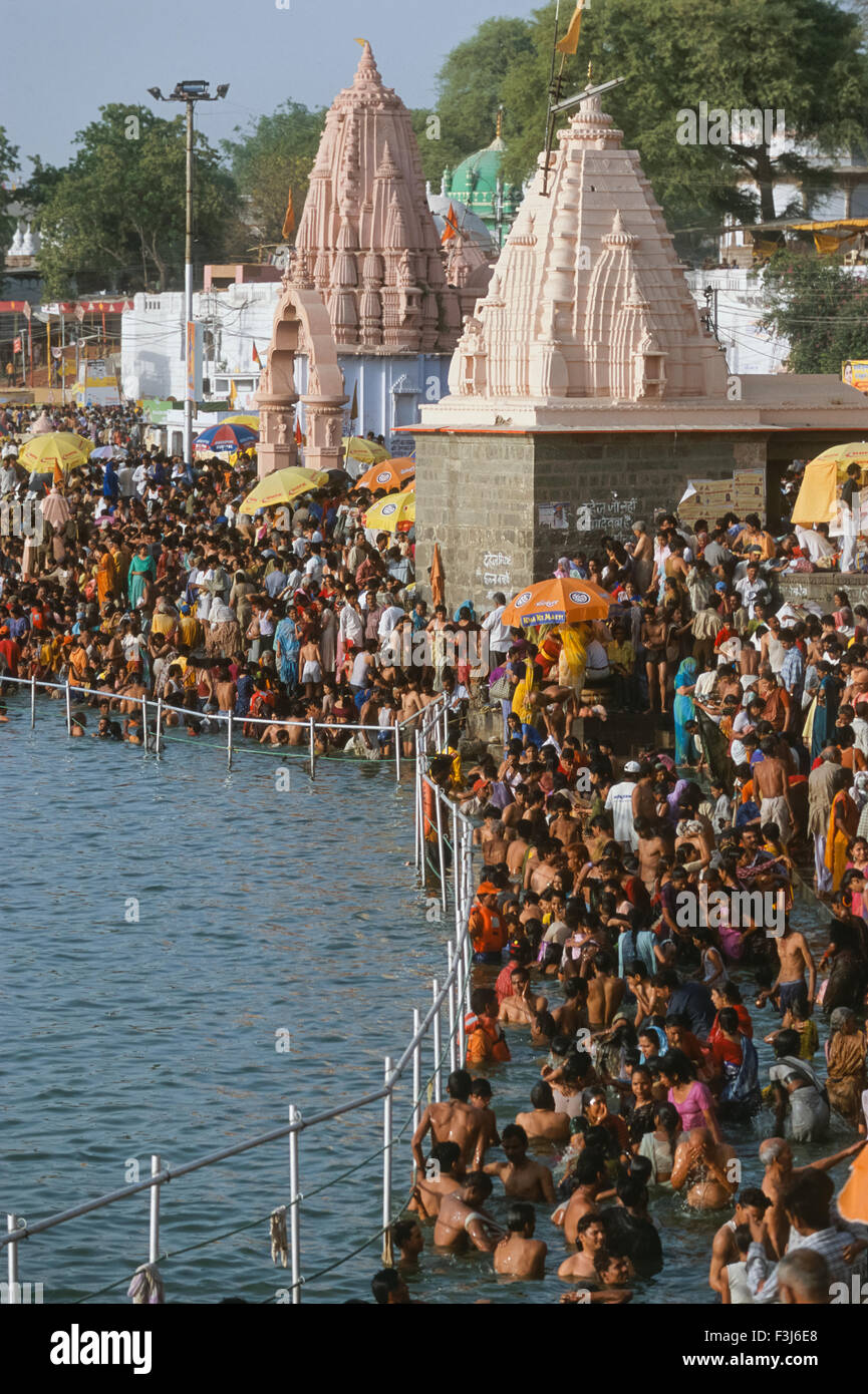 Bathing pilgrims thronging the ghats of the Shipra River, Simhastha ...