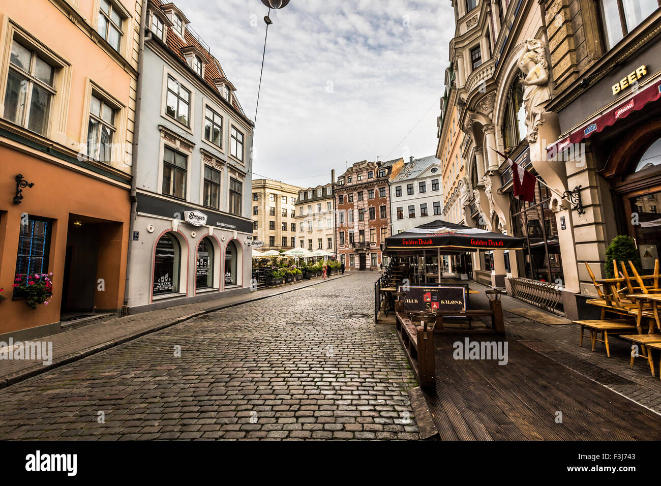 Morning street in medieval town of old Riga city, Latvia. Walking ...