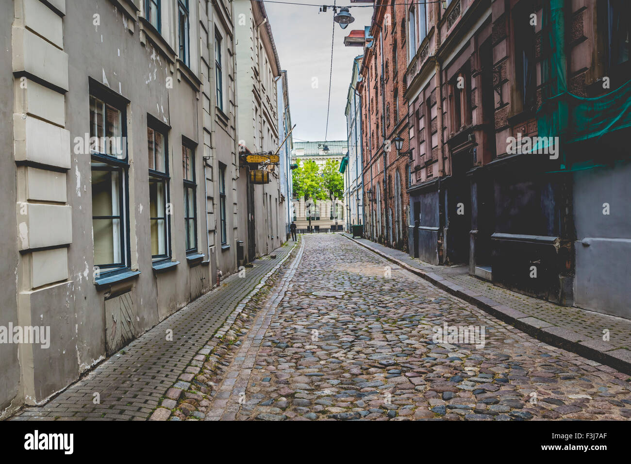 Morning street in medieval town of old Riga city, Latvia. Walking ...