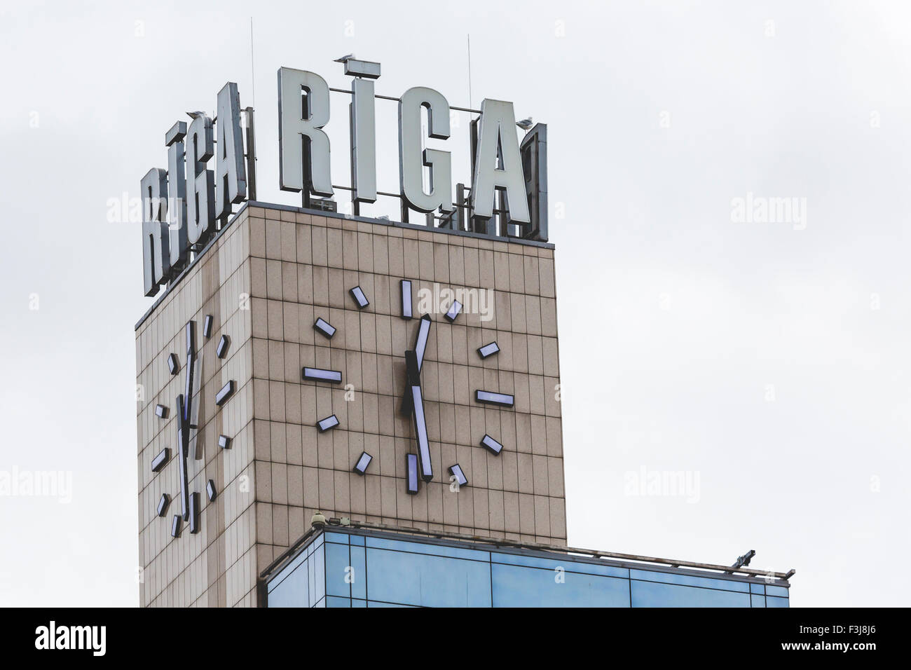 Clock tower in Riga, Latvia Stock Photo - Alamy