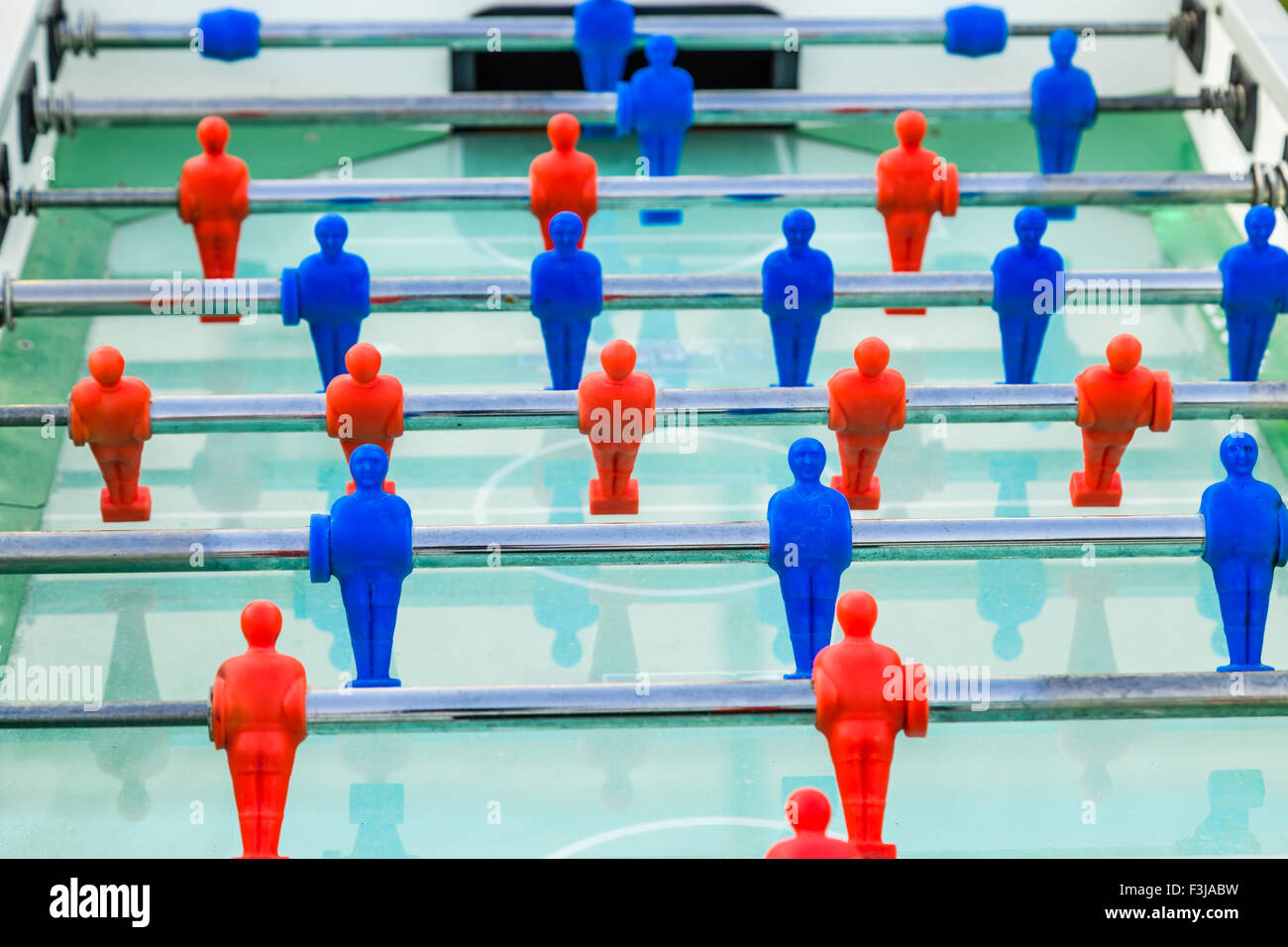 details of red and blue table football dummy players Stock Photo - Alamy