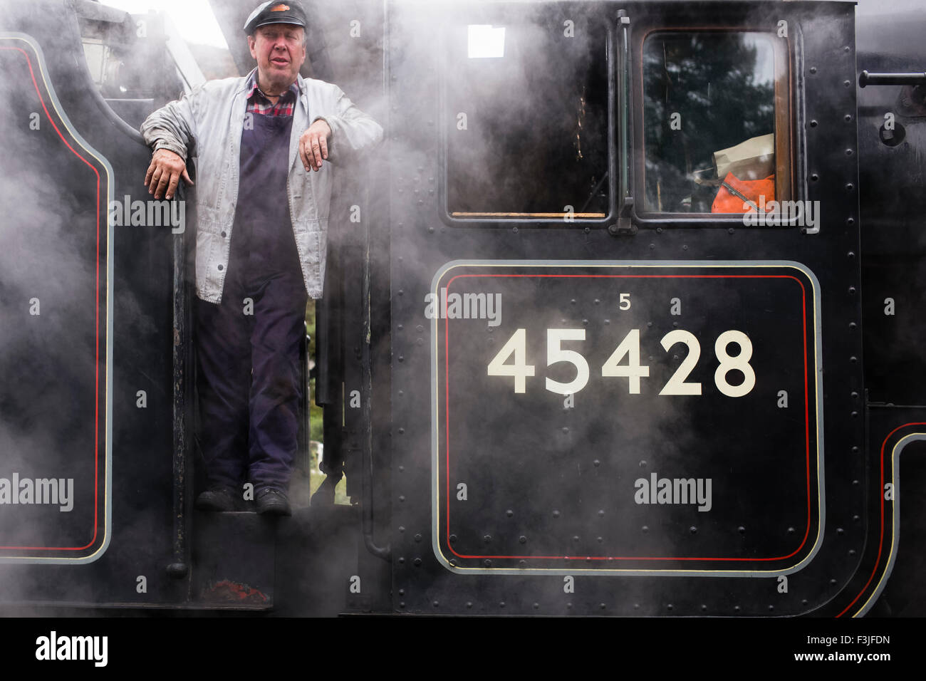 A driver amidst the steam of 'Bishop' 45428 Eric Treacy, Goathland ...