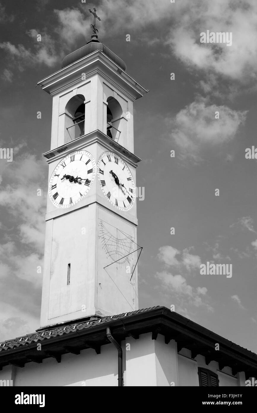 ancien clock tower in italy europe old stone and bell Stock Photo - Alamy