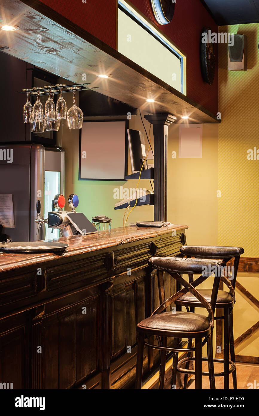 Interior of a modern cafe in retro style, night scene. Illumination ...