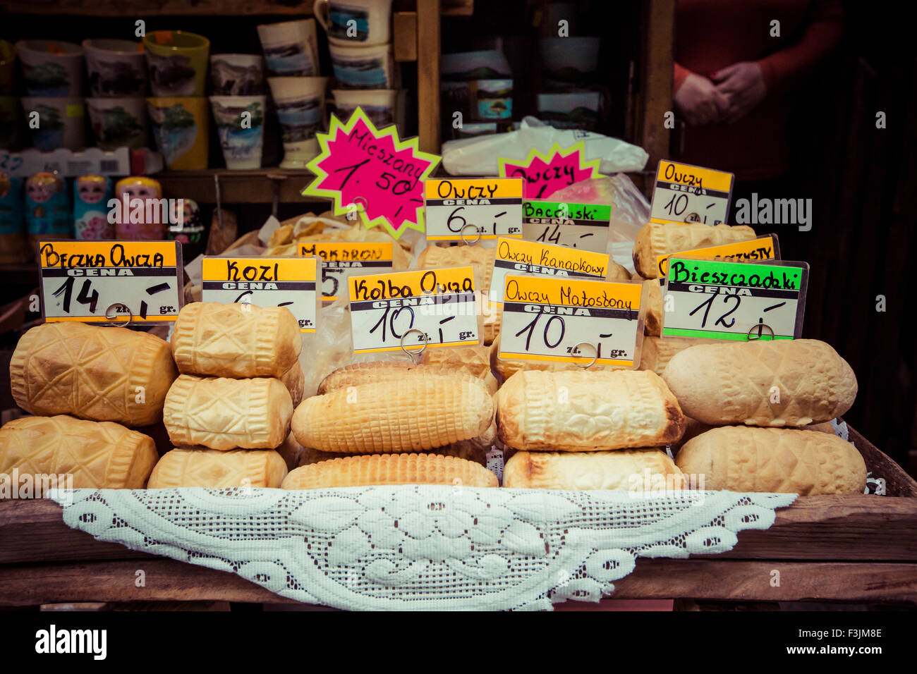 Traditional polish smoked cheese oscypek on outdoor market in Zakopane ...