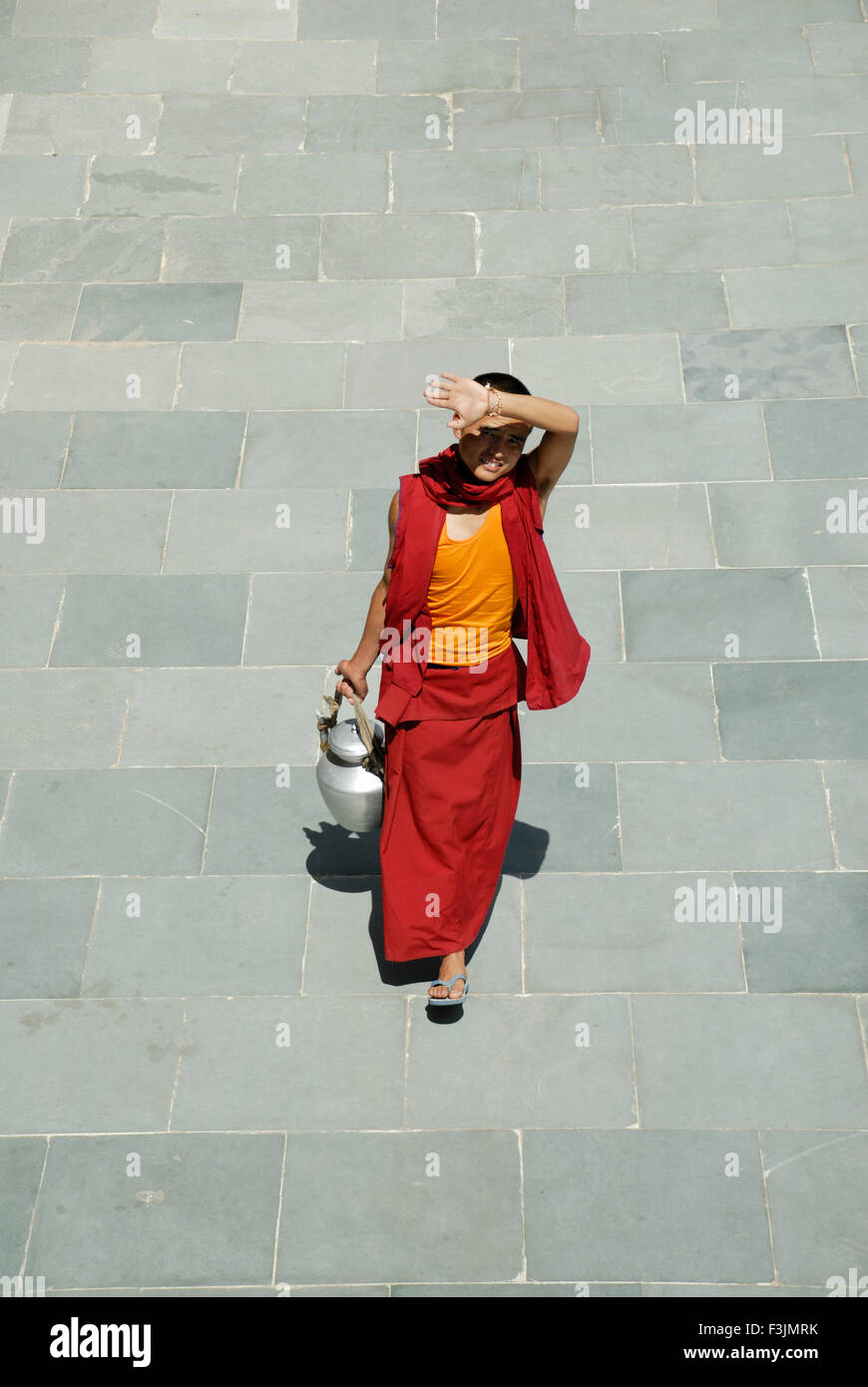 Boy Lama carrying water at Leh ; Ladakh ; Jammu & Kashmir ; India Stock ...