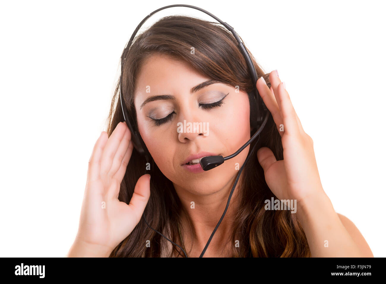 A friendly telephone operator smiling isolated over a white background ...